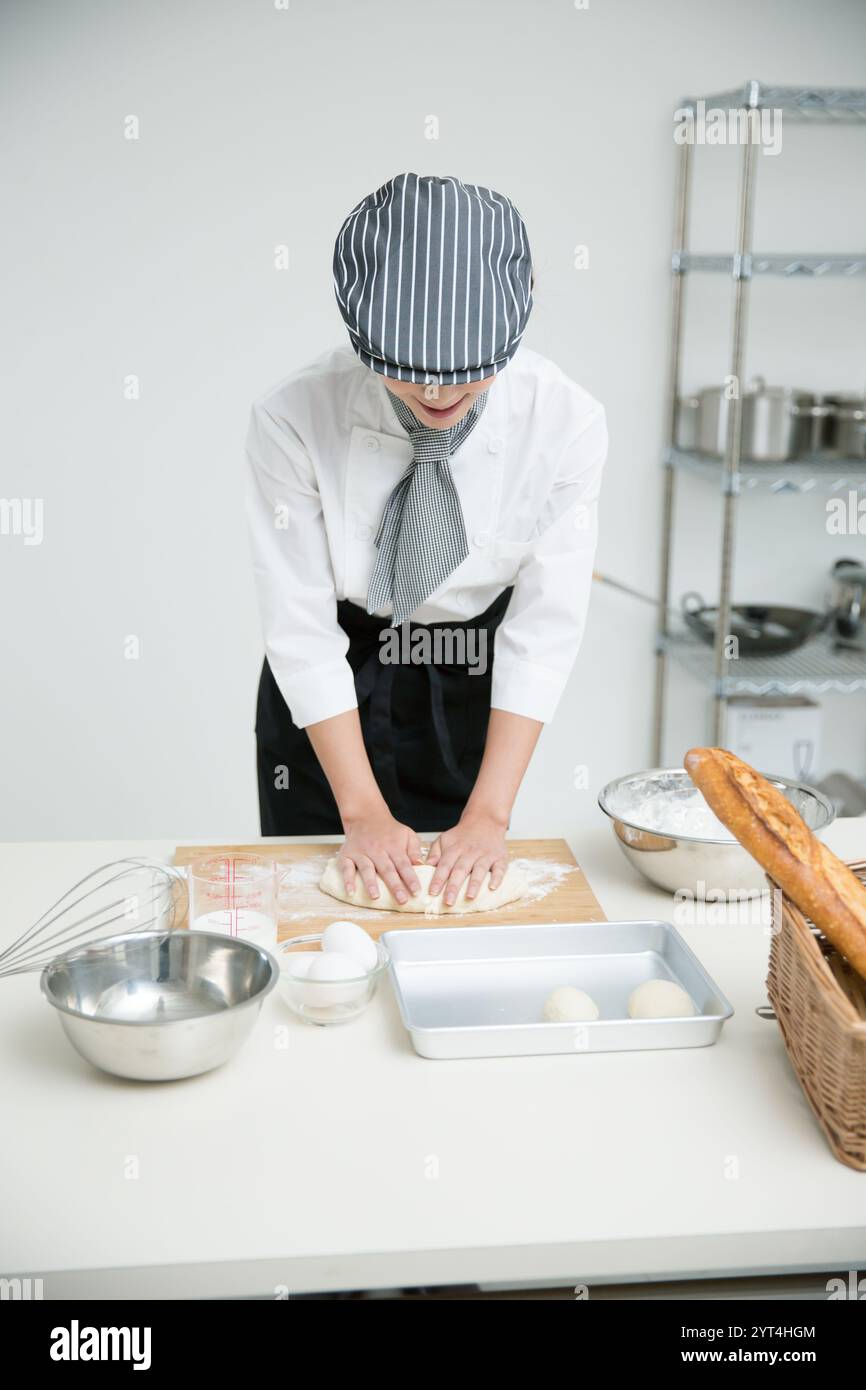 Baker making bread Stock Photo - Alamy