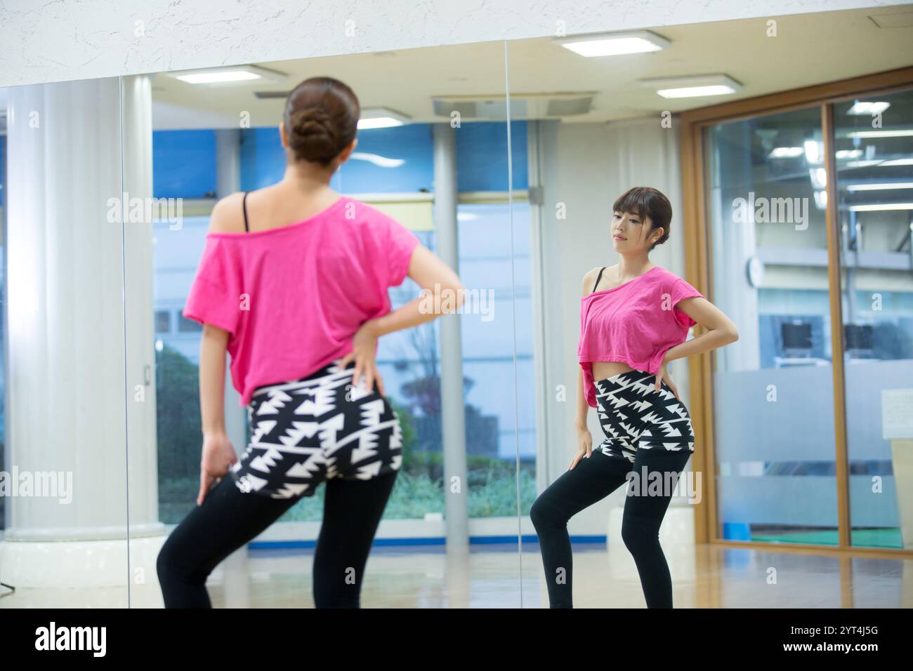Woman practising dance in studio Stock Photo - Alamy