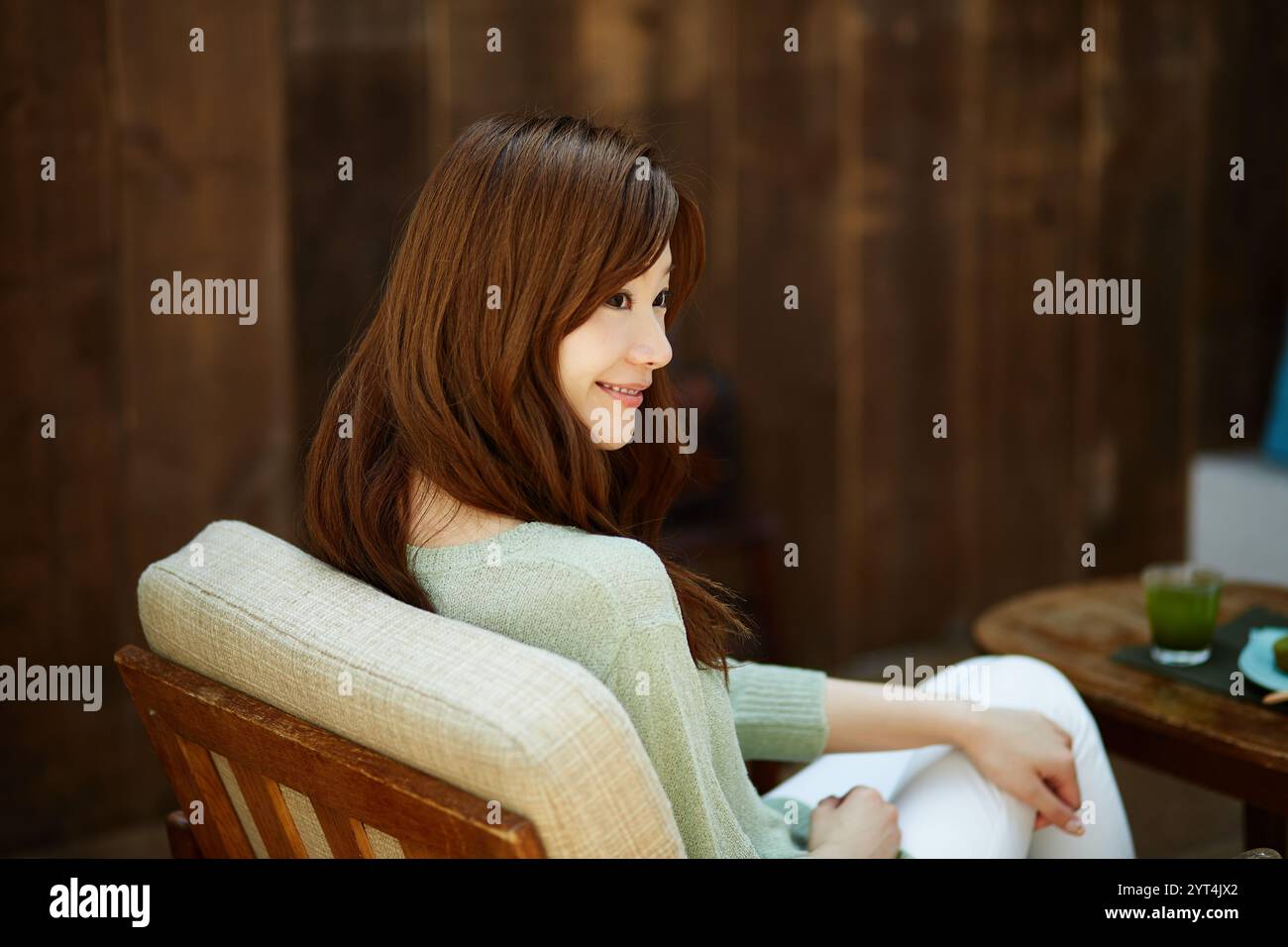 Refreshing woman relaxing at a café Stock Photo - Alamy
