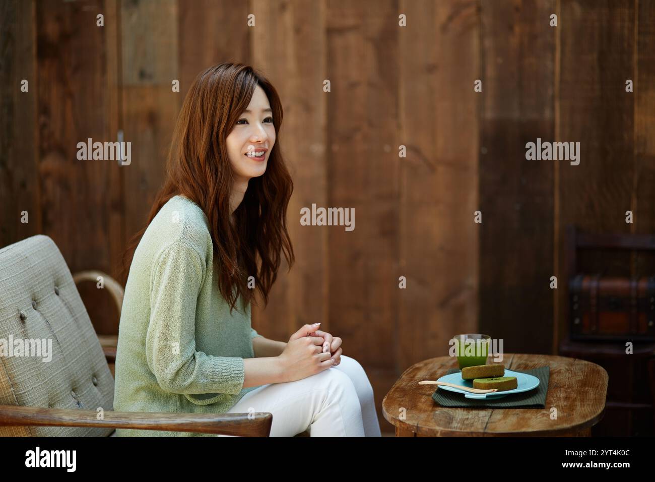 Refreshing woman relaxing at a café Stock Photo - Alamy