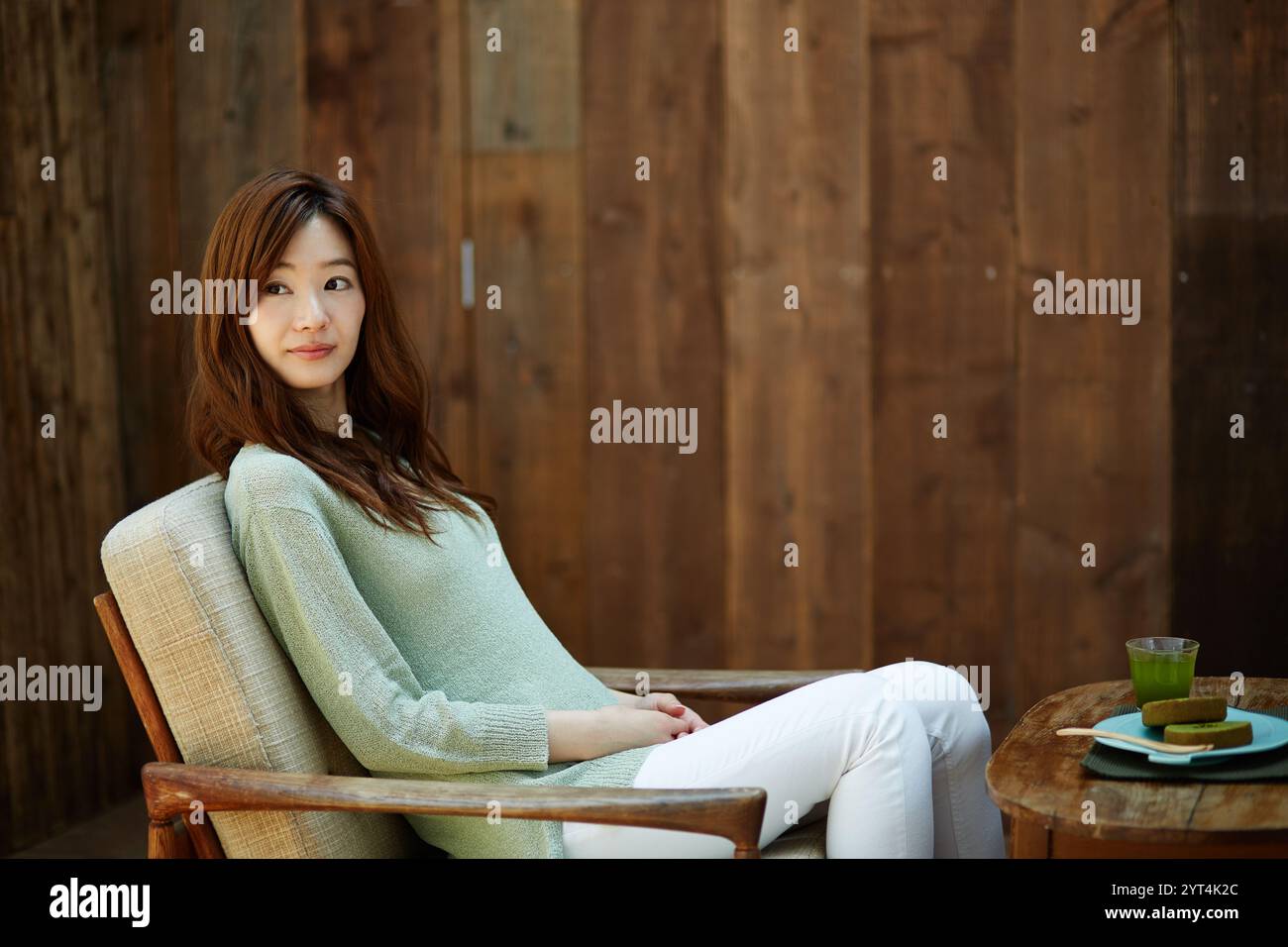 Refreshing woman relaxing at a café Stock Photo - Alamy