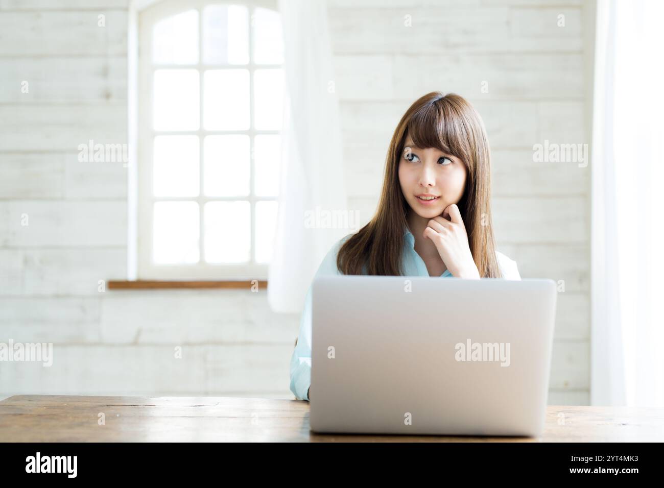 Women using laptops hi-res stock photography and images - Alamy
