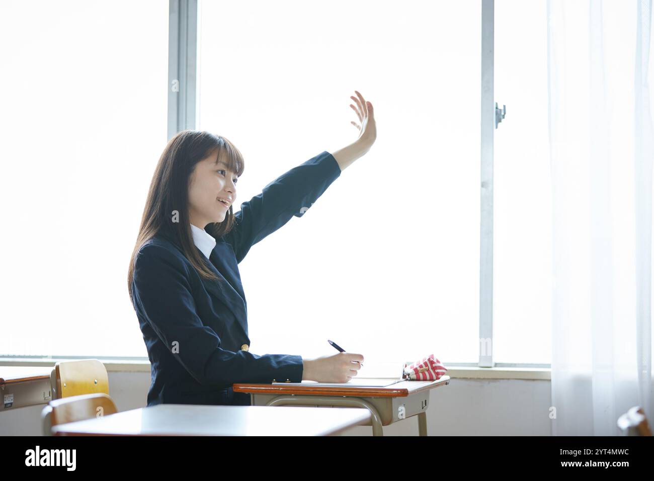 High school girls studying in a classroom Stock Photo - Alamy