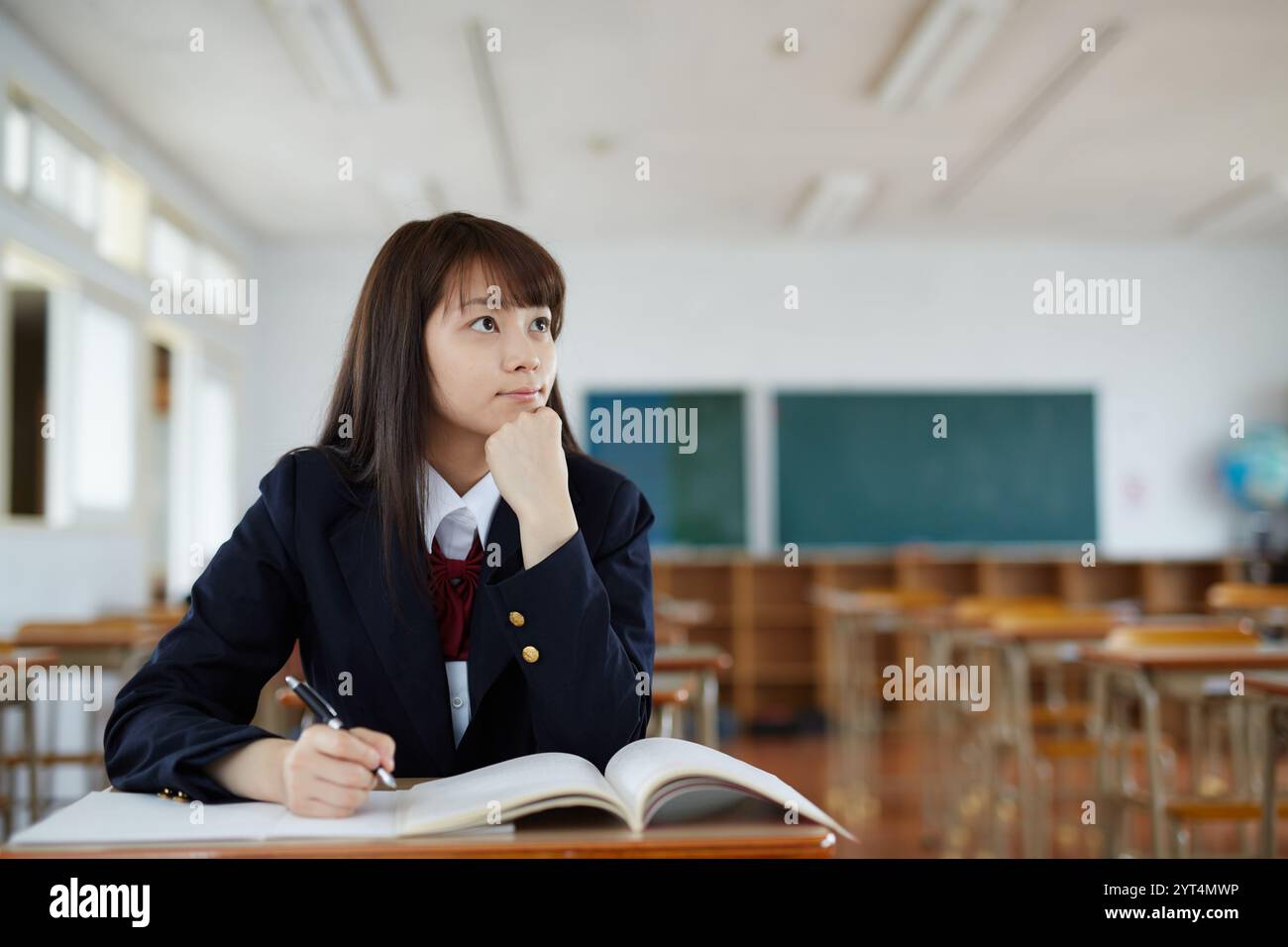 High school girls studying in a classroom Stock Photo - Alamy