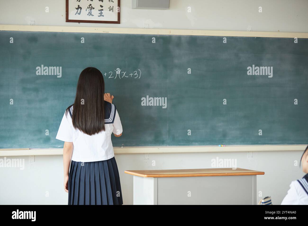 Students in sailor suits studying in a classroom Stock Photo - Alamy
