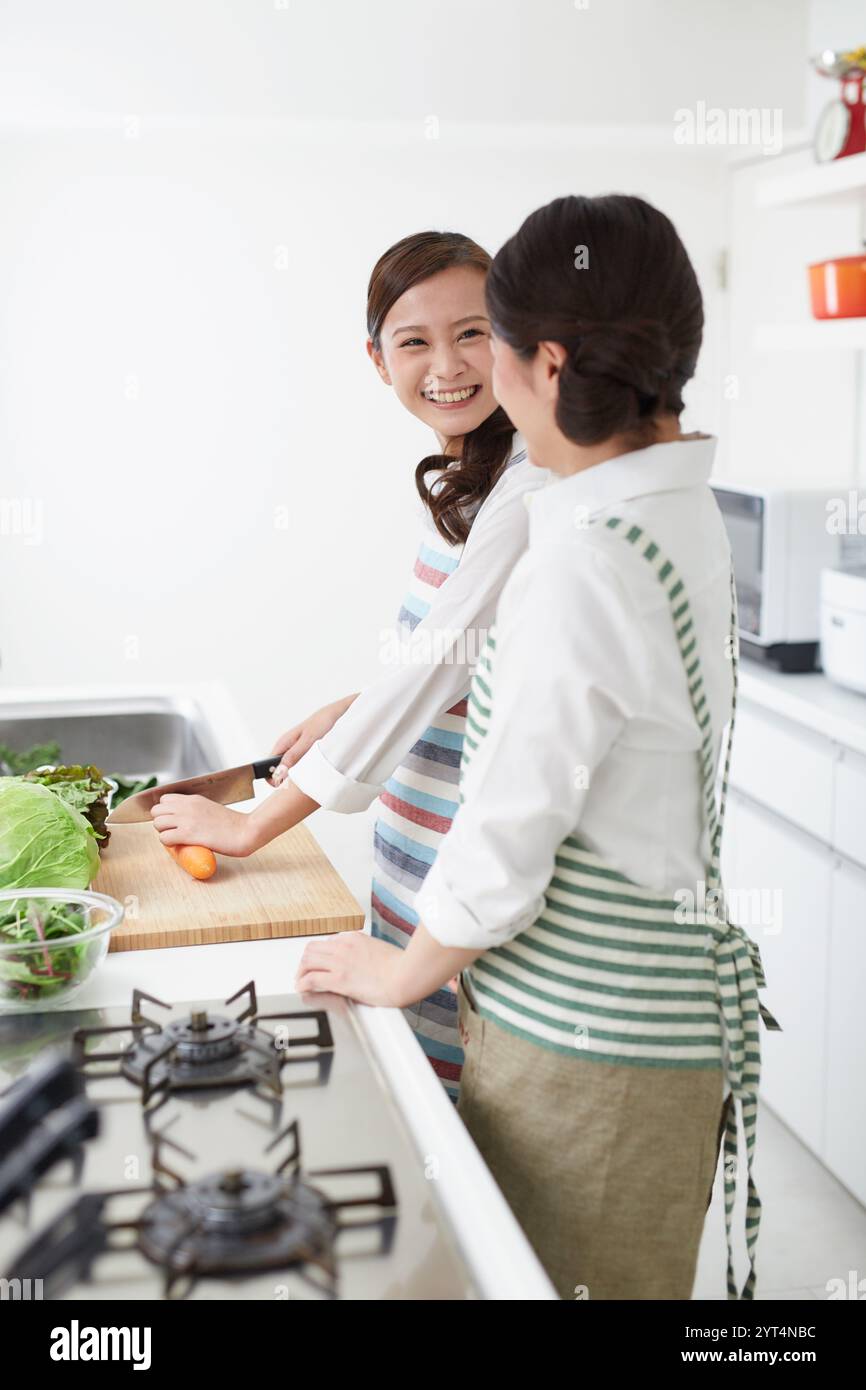 Two women at a cooking class Stock Photo - Alamy