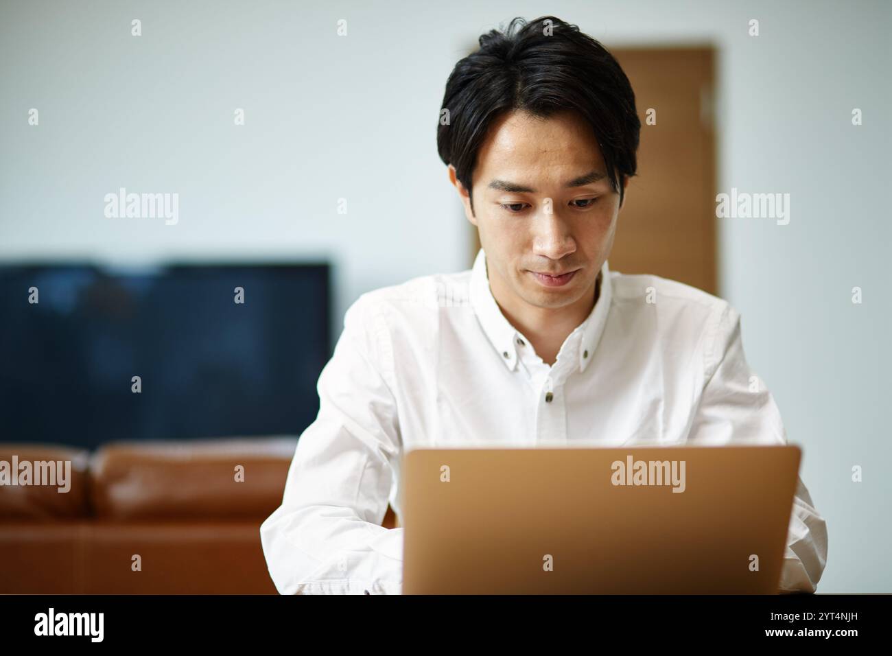 Man using computer Stock Photo - Alamy