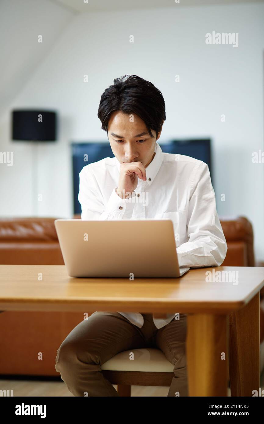 Man using computer Stock Photo - Alamy