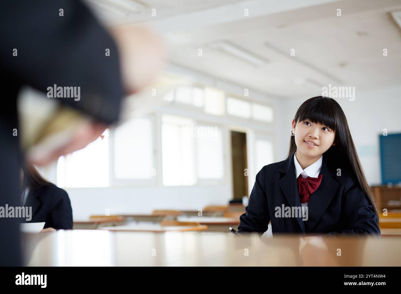 Female high school students in class Stock Photo - Alamy