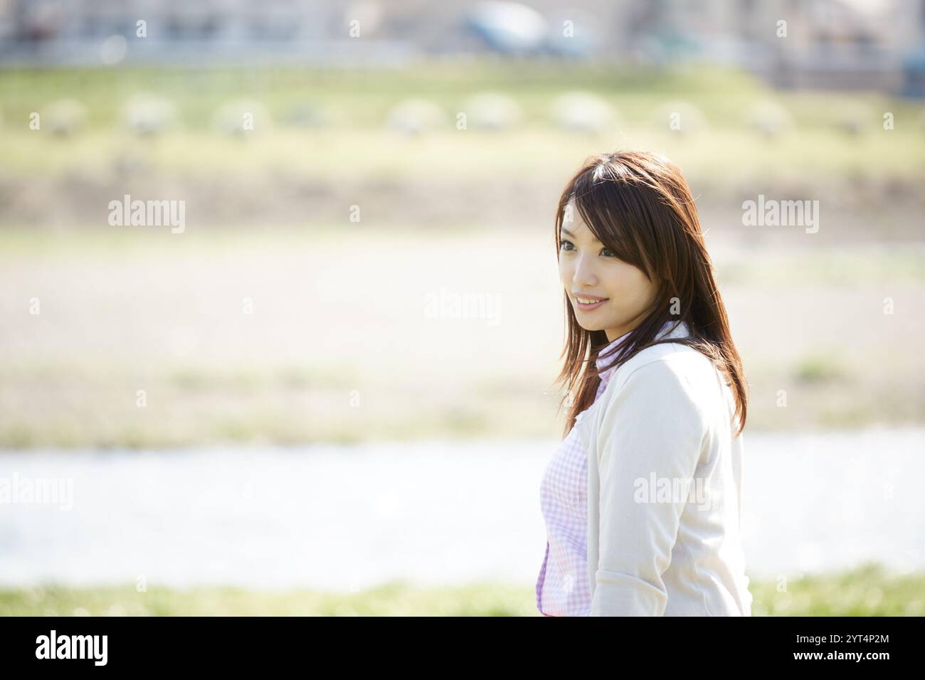 Young woman semi profile hi-res stock photography and images - Alamy
