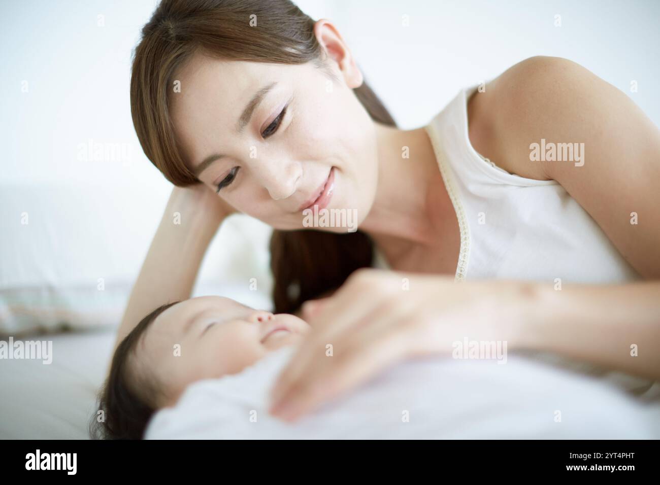 Baby and mother Stock Photo - Alamy