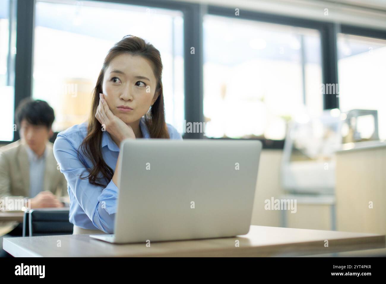 Woman using computer Stock Photo - Alamy