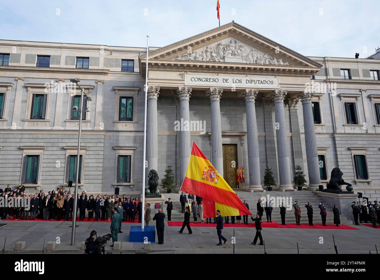 The Spanish national flag is raised during a celebration ceremony ...