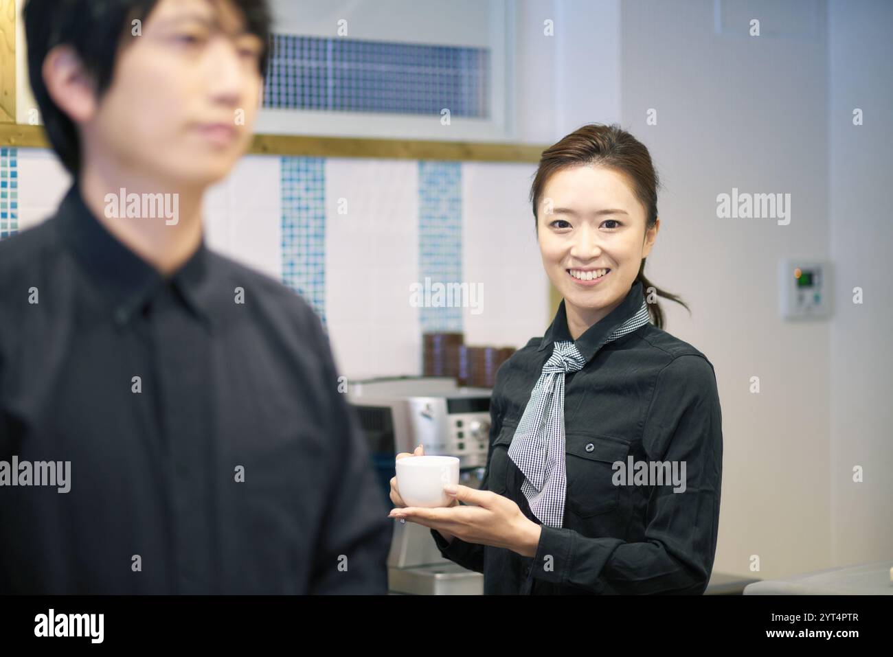 Staff working in café Stock Photo - Alamy