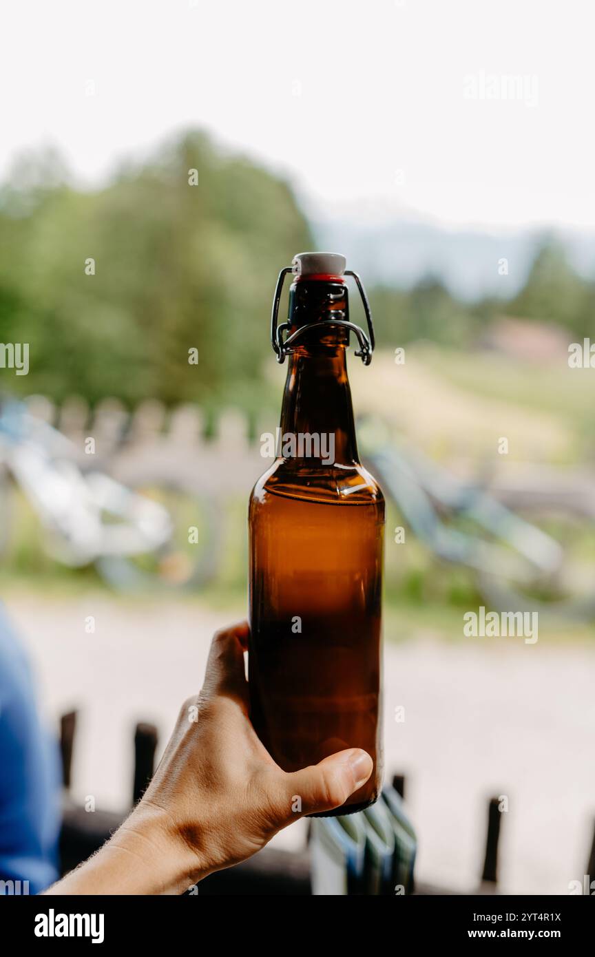 Traditional German Beer Bottle in Alpine Setting Stock Photo - Alamy