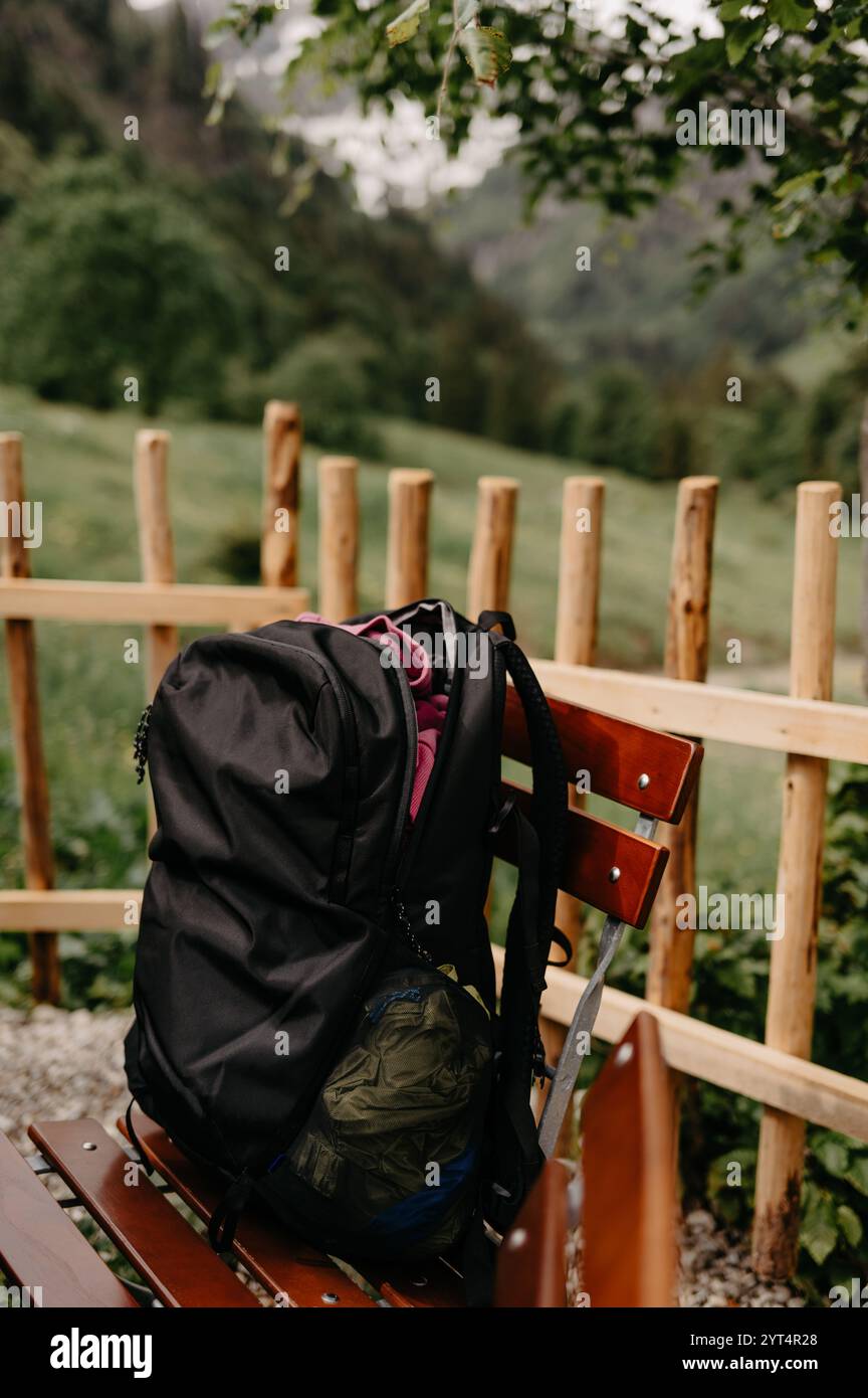 Outdoor Adventure Gear: Mountain Backpack on Wooden Bench Stock Photo ...