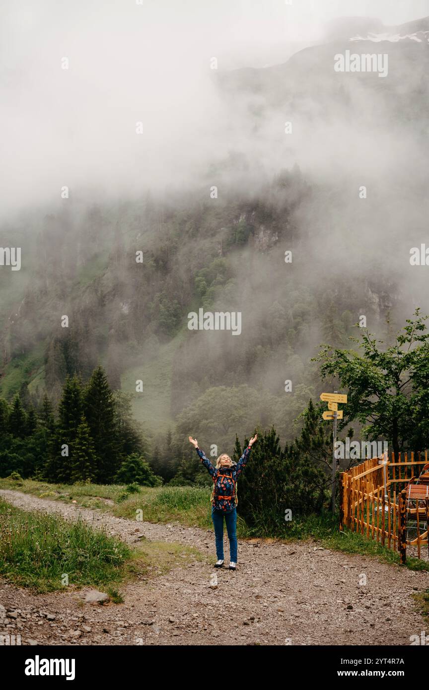Hiker Breathing in Fresh Mountain air in Misty German Alps Stock Photo ...