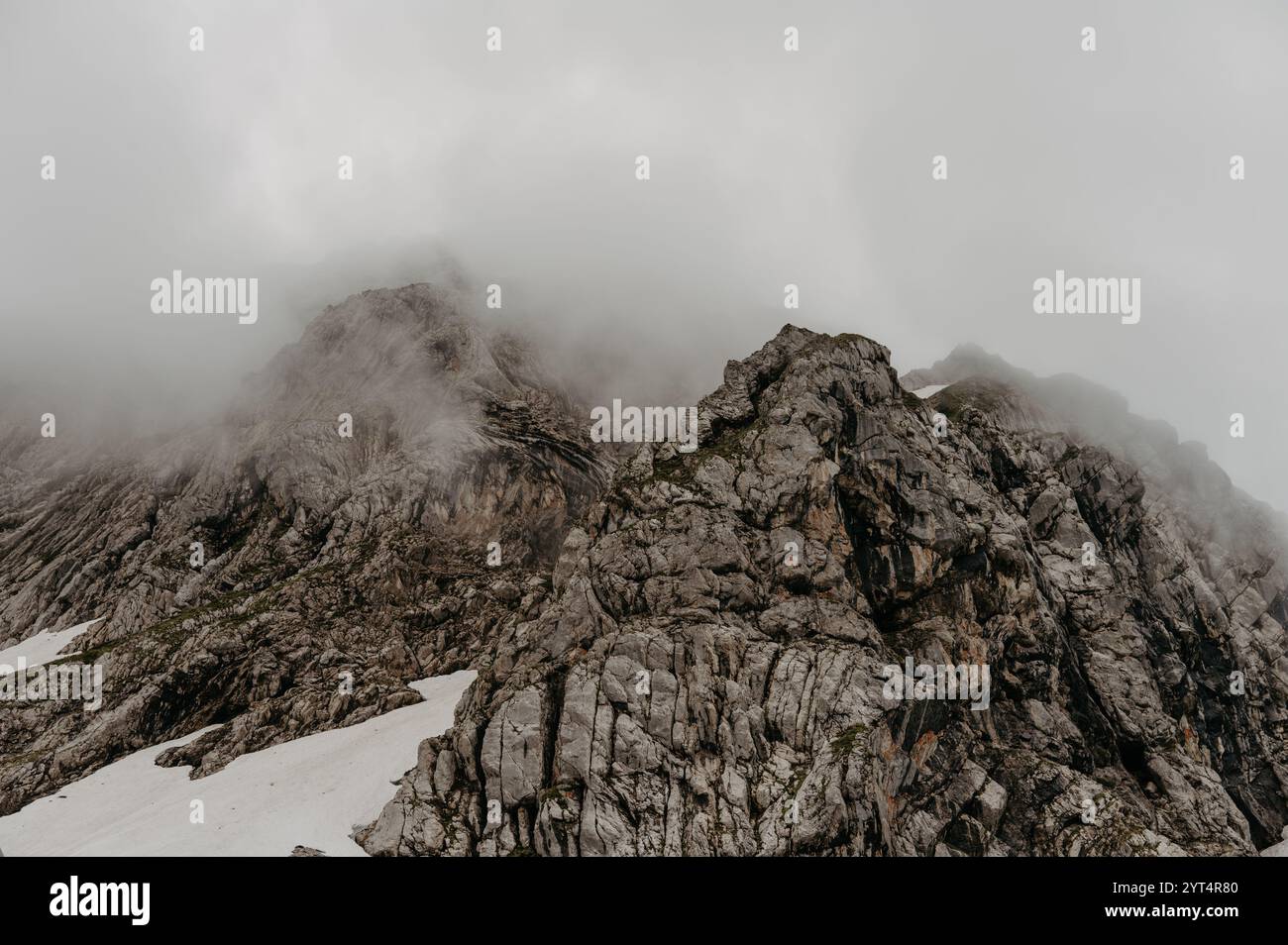 Dramatic Fog Rolling Over Mountain Ridge Stock Photo - Alamy
