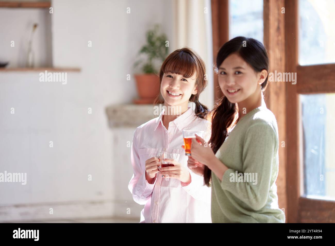 Two women at tea time Stock Photo - Alamy