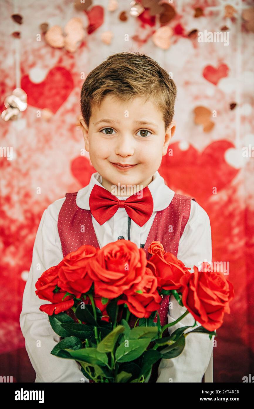 Boy with roses hi-res stock photography and images - Alamy
