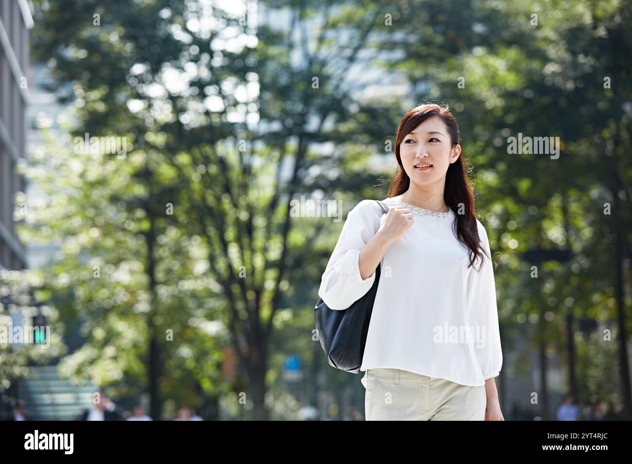 Business woman walking smile hi-res stock photography and images - Alamy