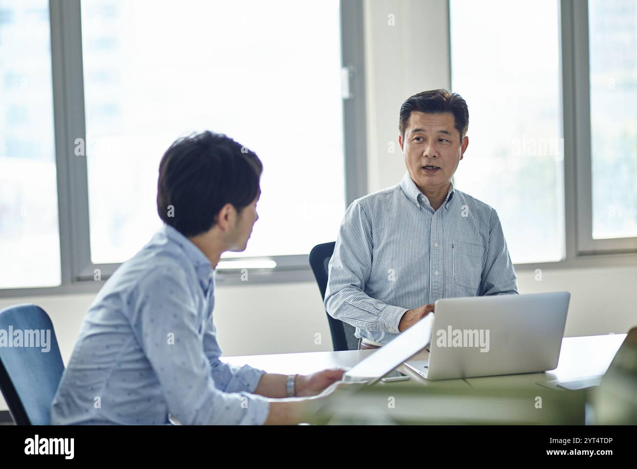 Business staff during meeting Stock Photo - Alamy