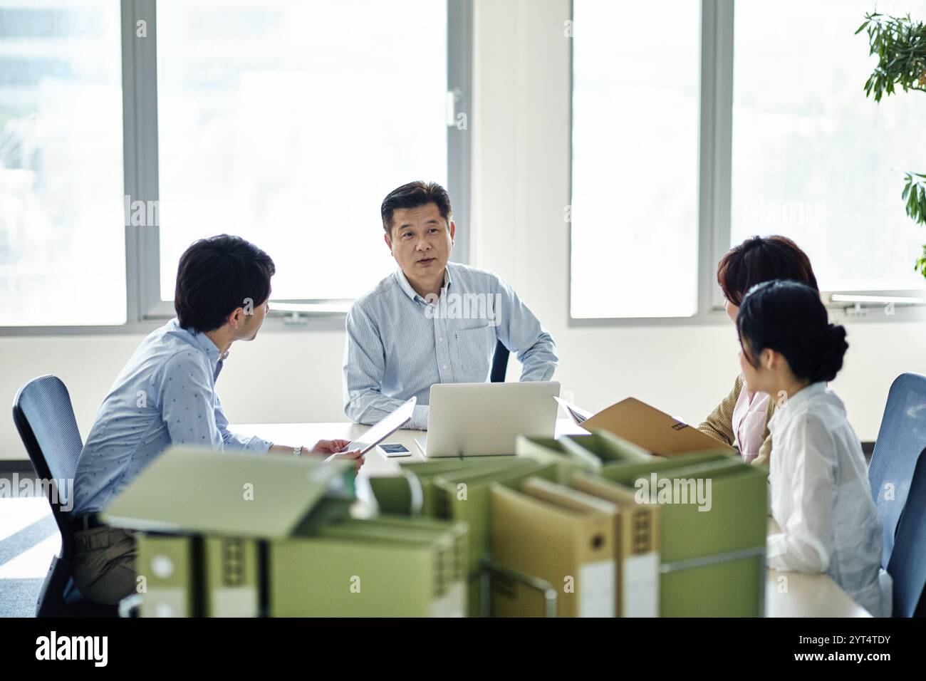 Business staff during meeting Stock Photo - Alamy