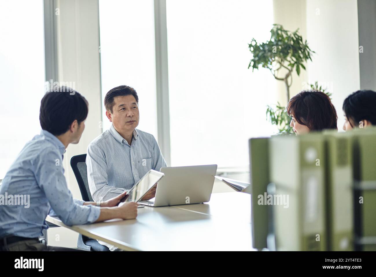 Business staff during meeting Stock Photo - Alamy