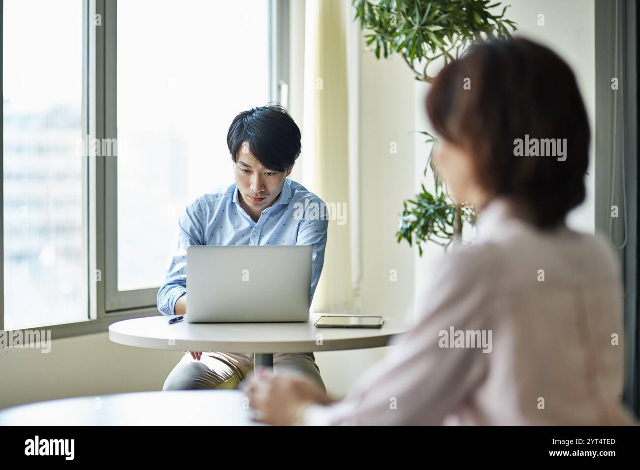 Man using computer Stock Photo - Alamy