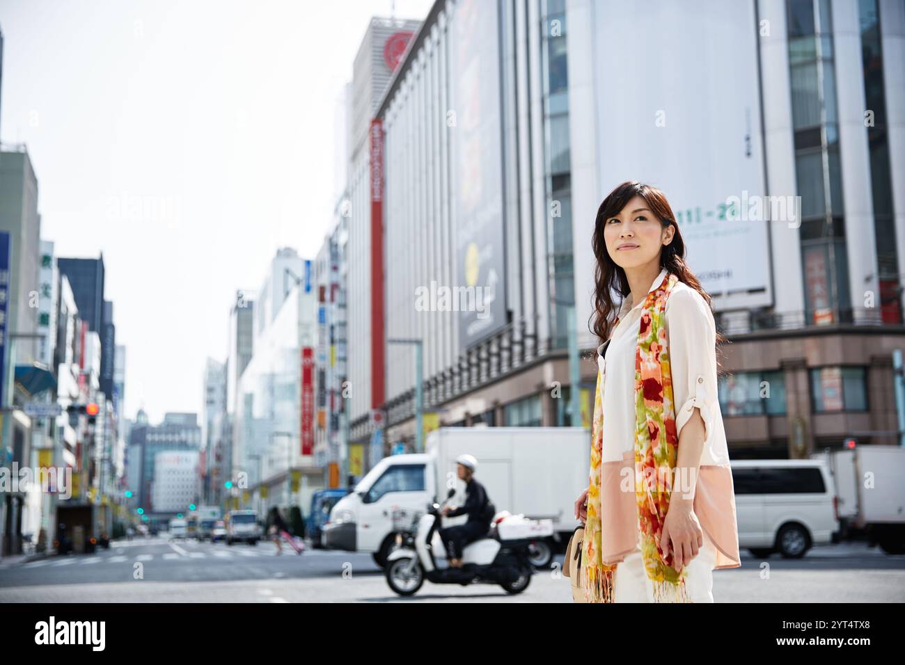 Refreshing woman walking in Ginza Stock Photo - Alamy