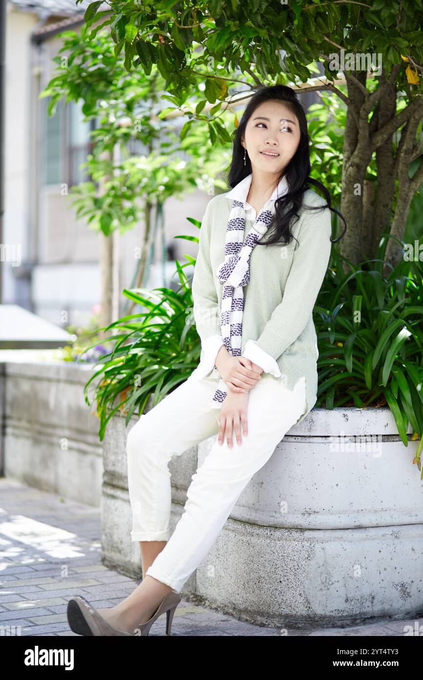 Fresh green and young woman Stock Photo - Alamy