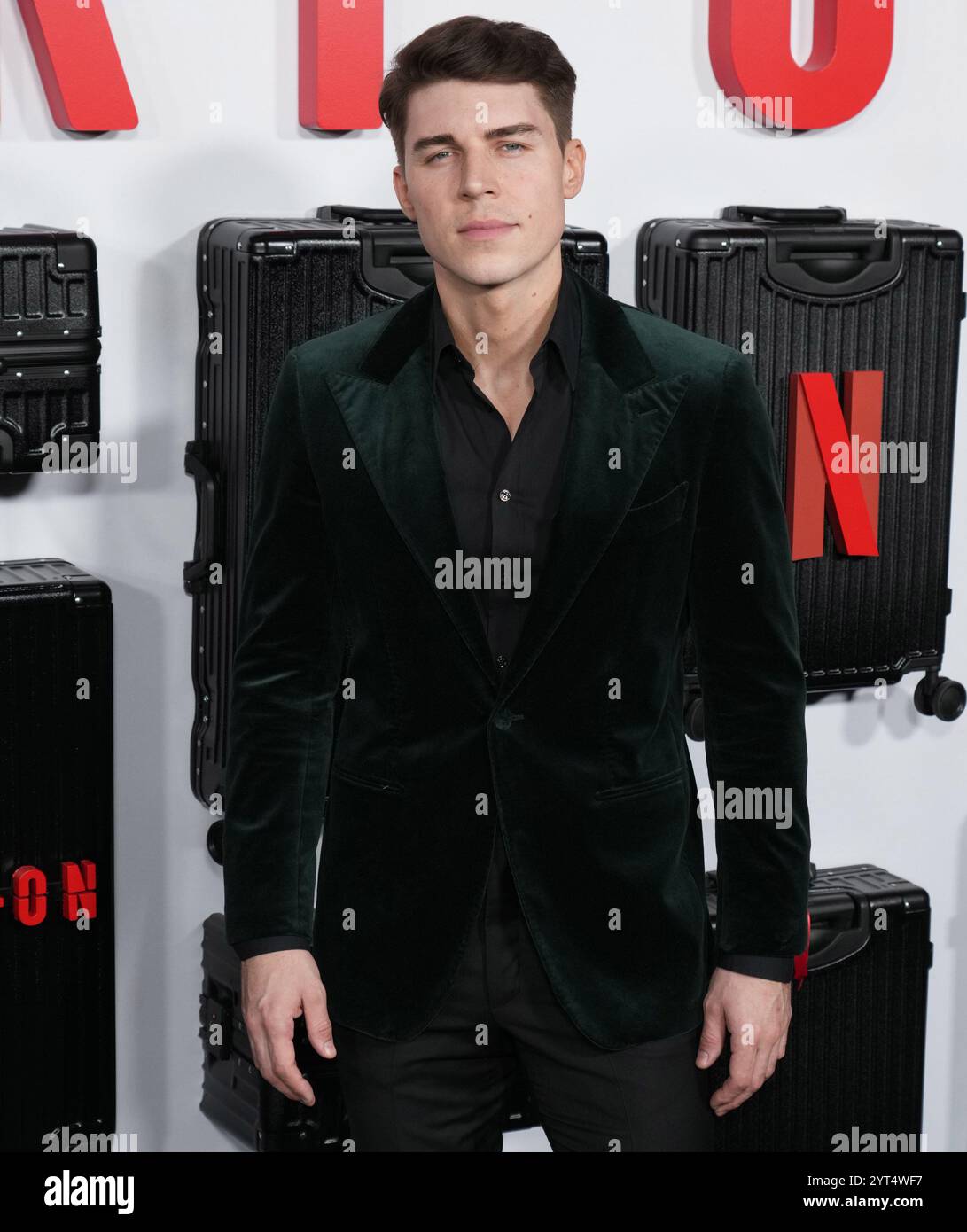 Nolan Gerard Funk arrives at Netflix's CARRY ON Premiere held at The ...
