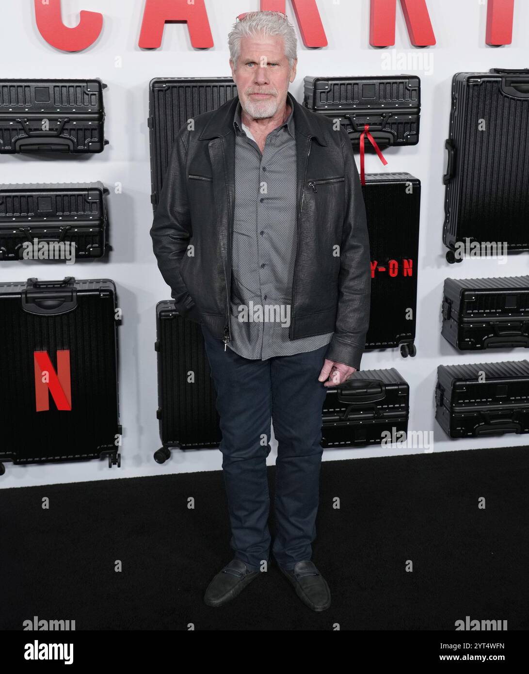 Ron Perlman arrives at Netflix's CARRY ON Premiere held at The Egyptian ...
