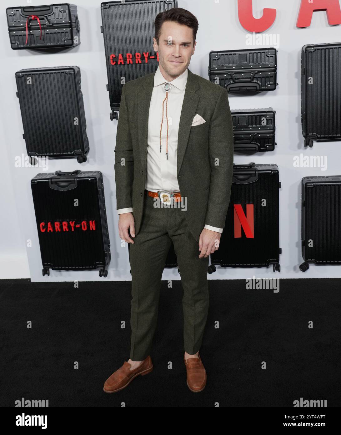 Spencer Crim arrives at Netflix's CARRY ON Premiere held at The ...