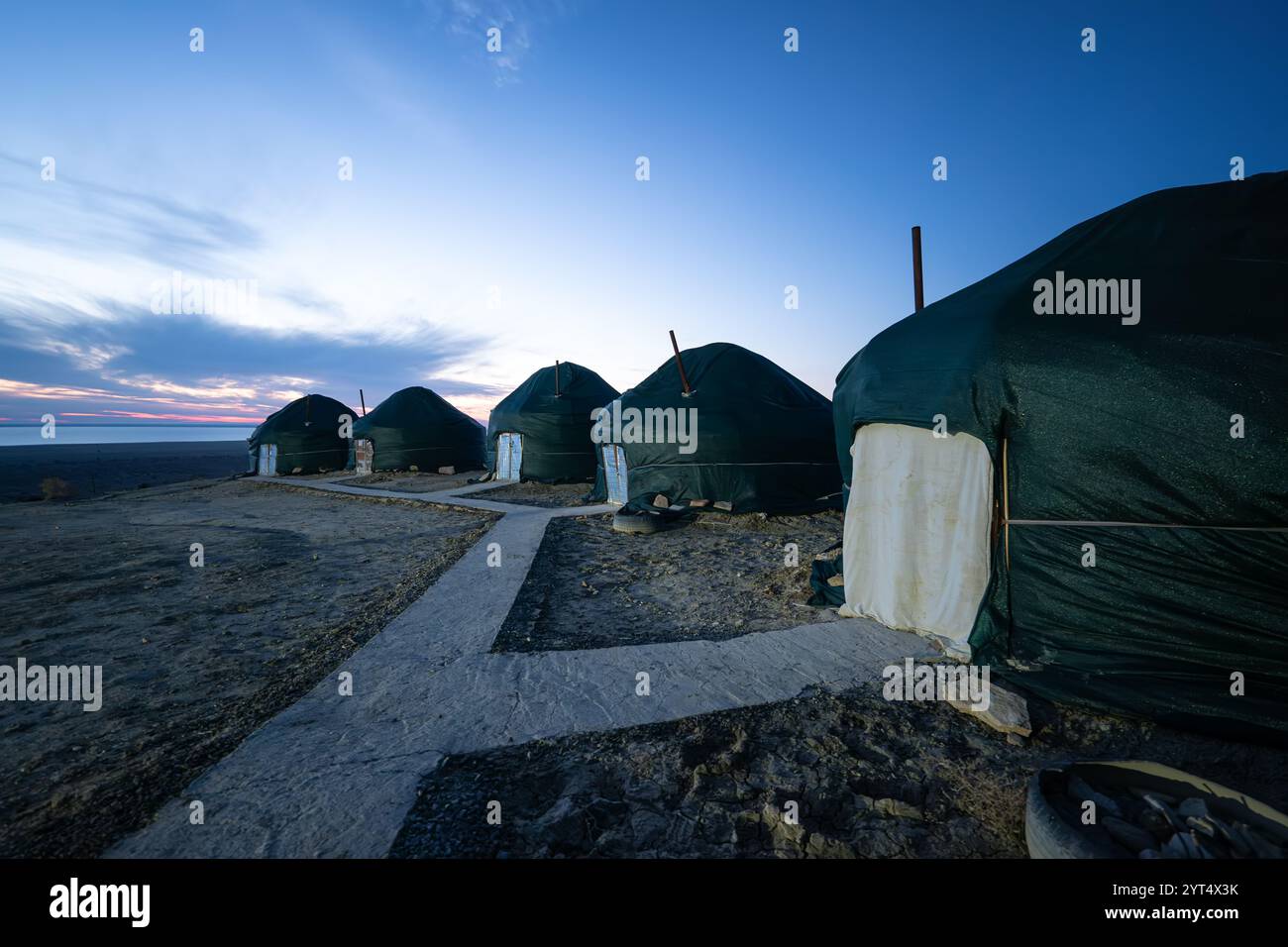 Yurt Camp by the Aral Sea against the background of a beautiful blue ...