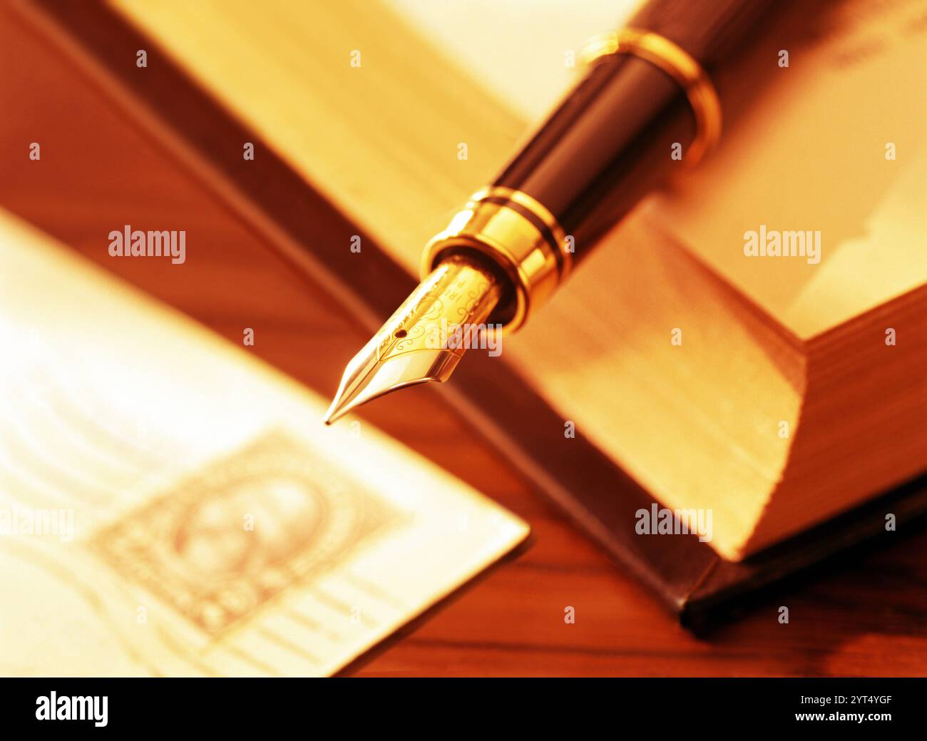 Fountain pen, book and letter Stock Photo - Alamy