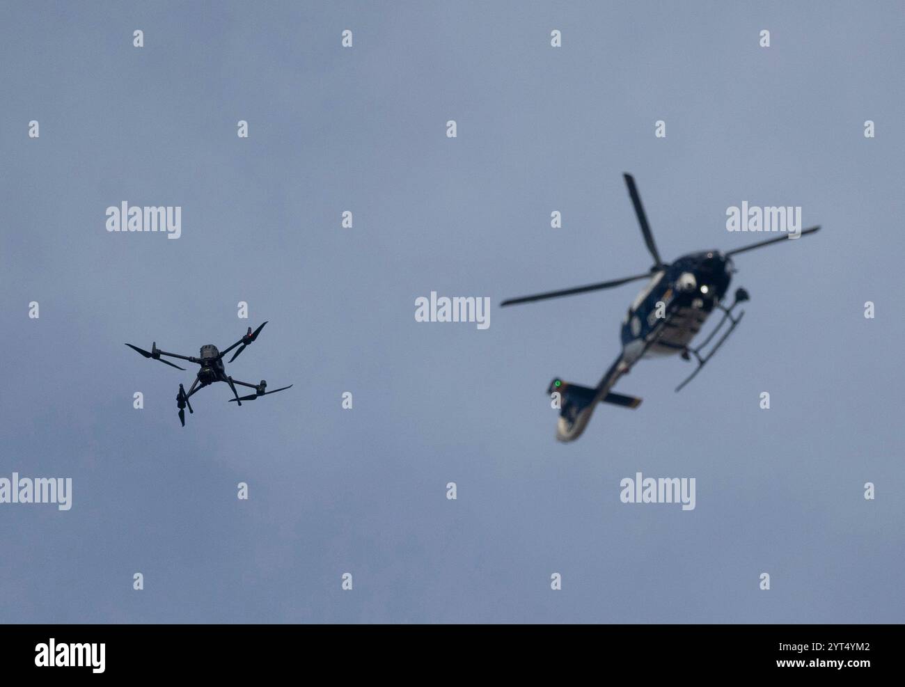 A drone and a helicopter during the Solemn Raising of the Spanish flag ...