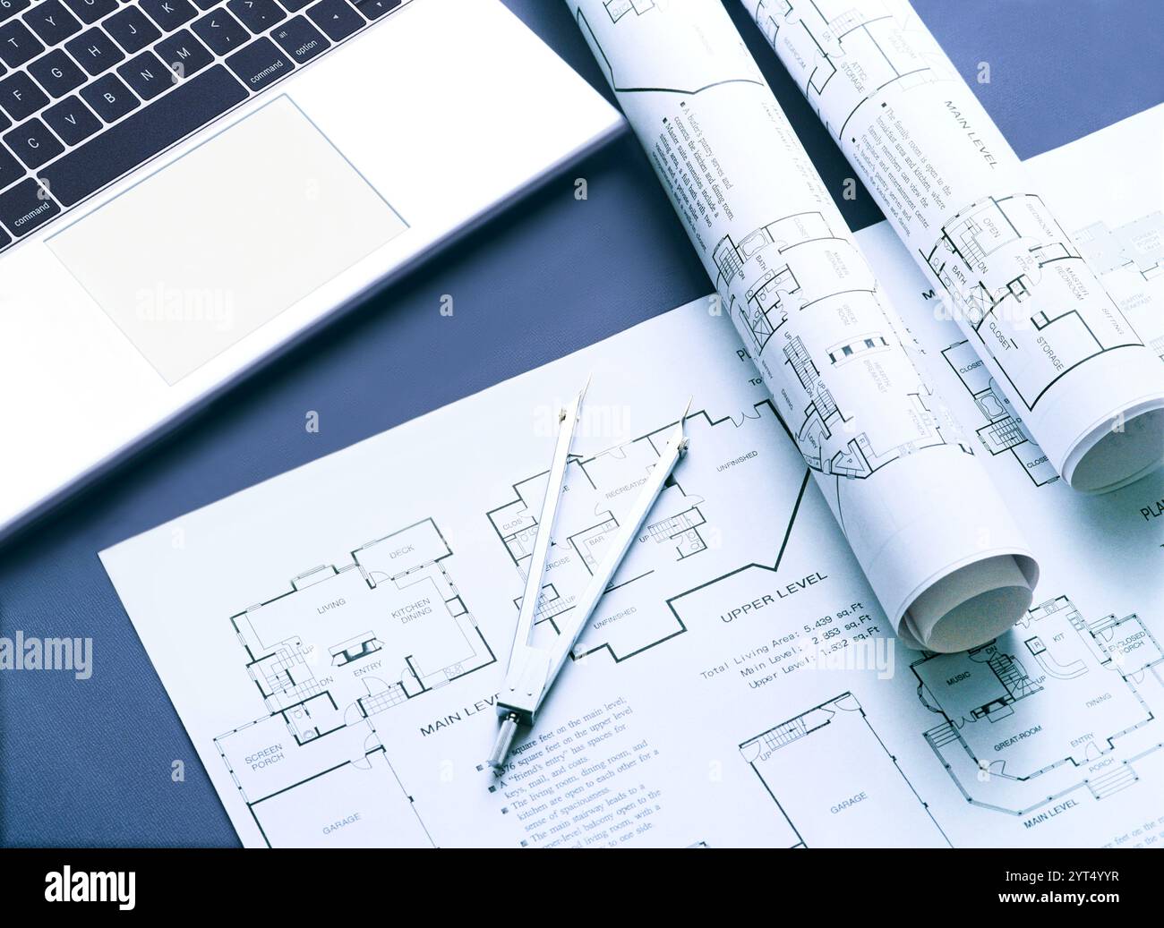 Personal computers and floor plans Stock Photo - Alamy