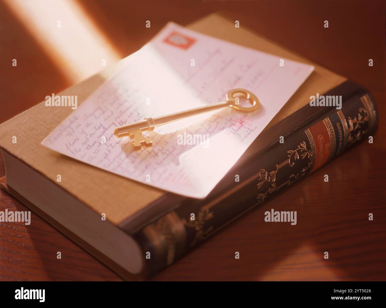 Key, book and letter Stock Photo - Alamy