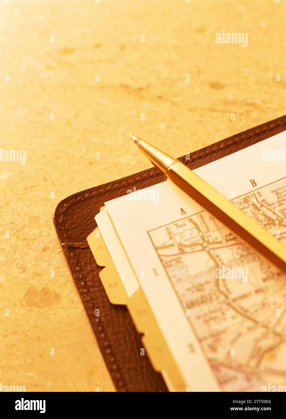 Pen and map Stock Photo - Alamy