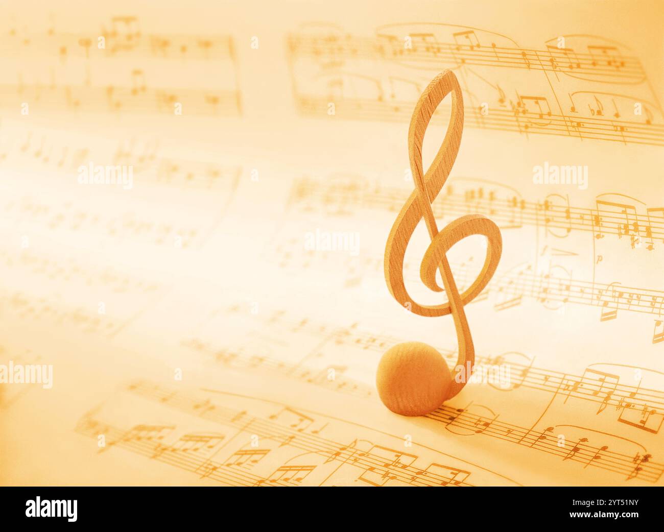 G clef and sheet music Stock Photo - Alamy