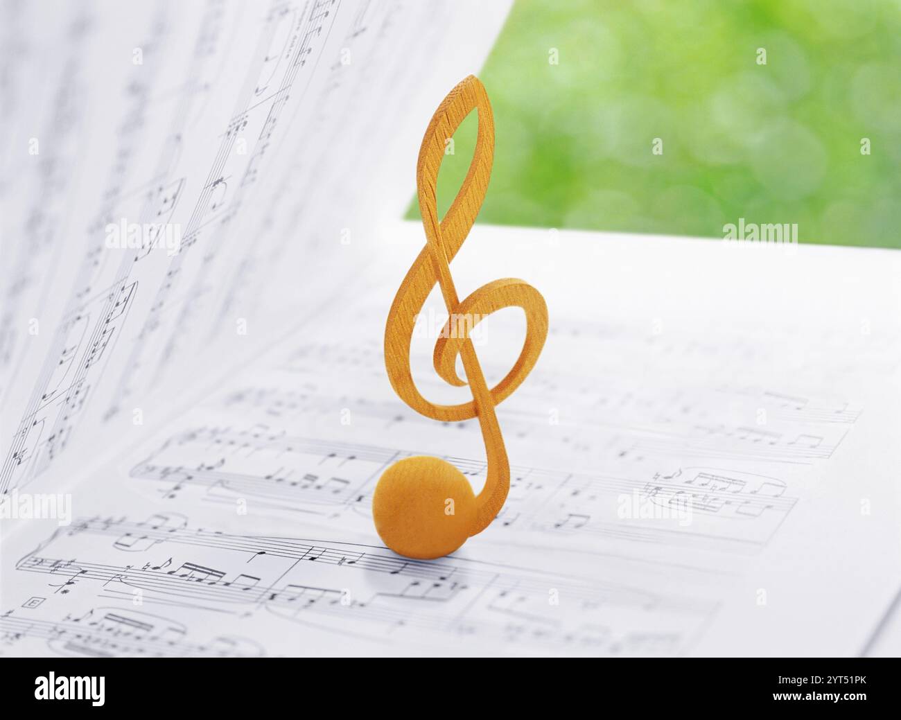 G clef and sheet music Stock Photo - Alamy