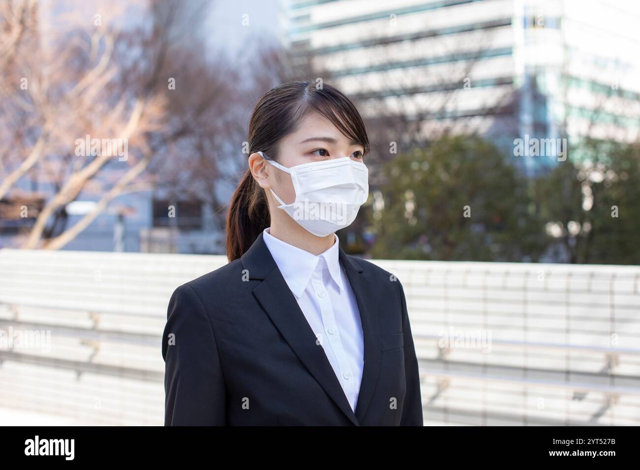 Woman wearing a mask Stock Photo - Alamy