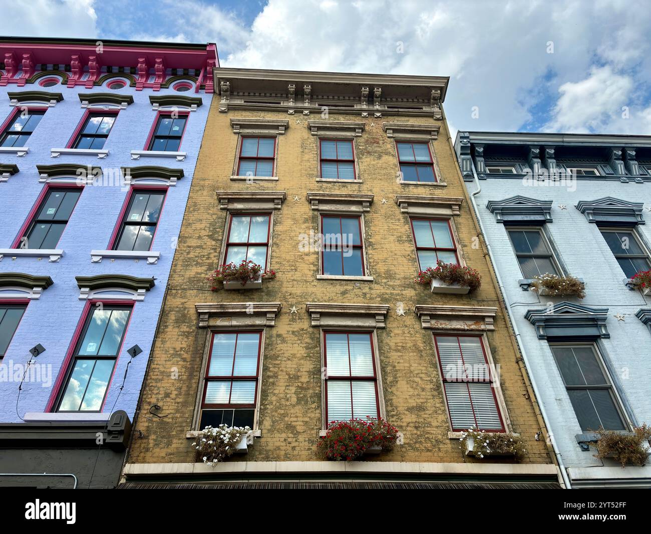 Historic brick buildings in Cincinnati with flowers in windowboxes ...