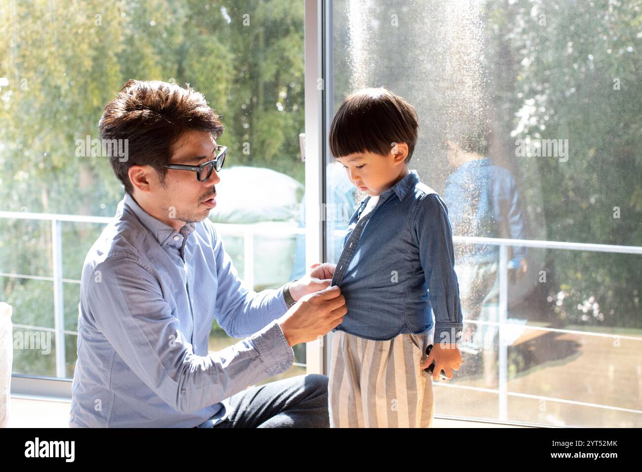 Family green clothes hi-res stock photography and images - Alamy