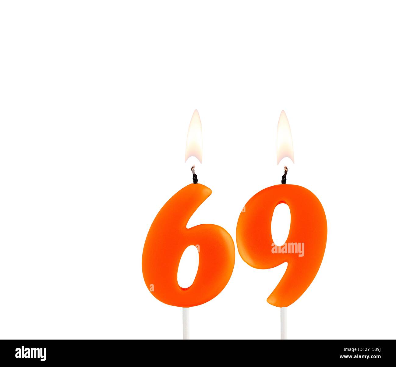 Lit birthday candle - Candle number 69 on white background Stock Photo ...
