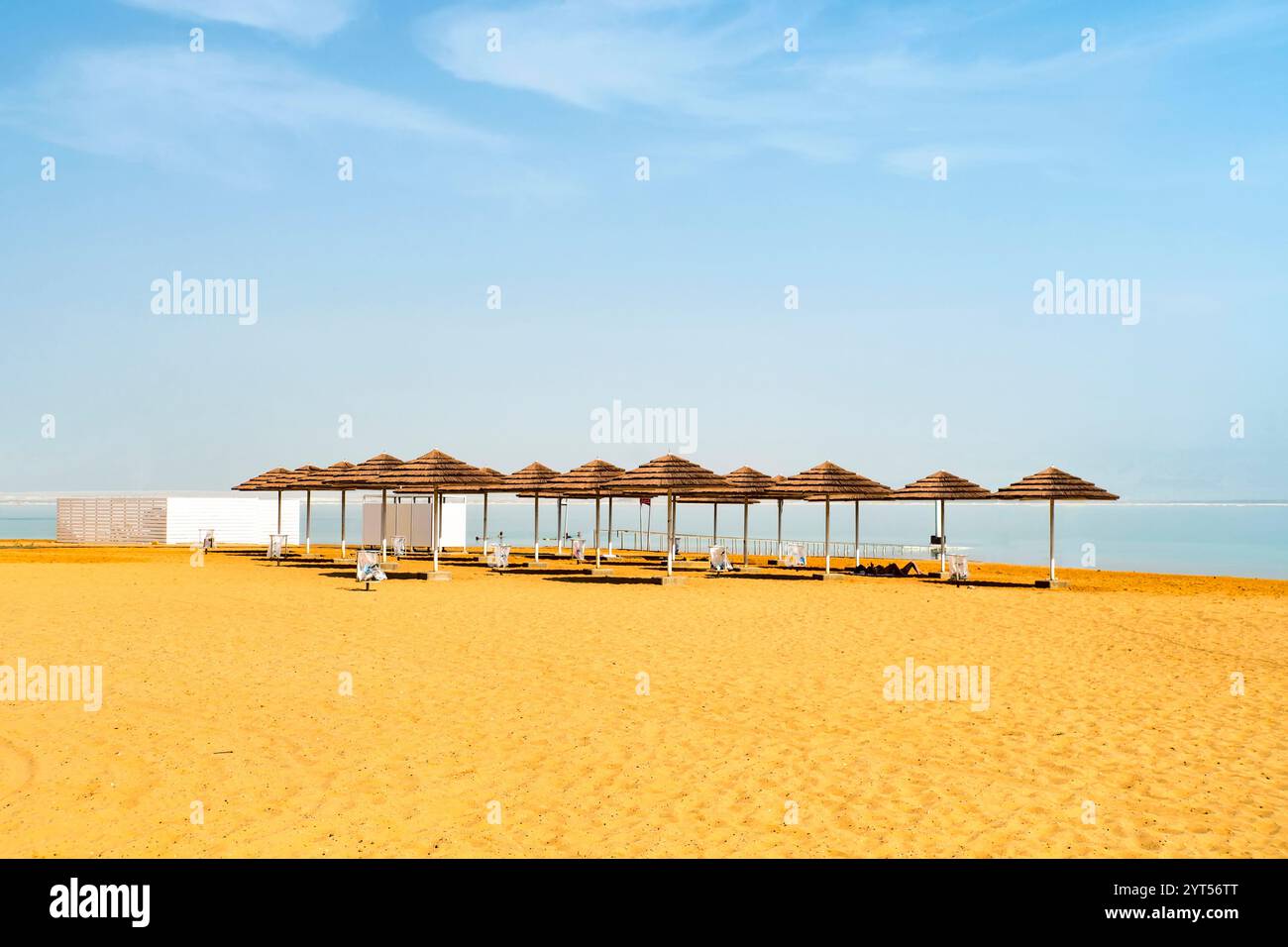 Sun beds, chairs, umbrellas and awnings on the beach luxury hotel on ...