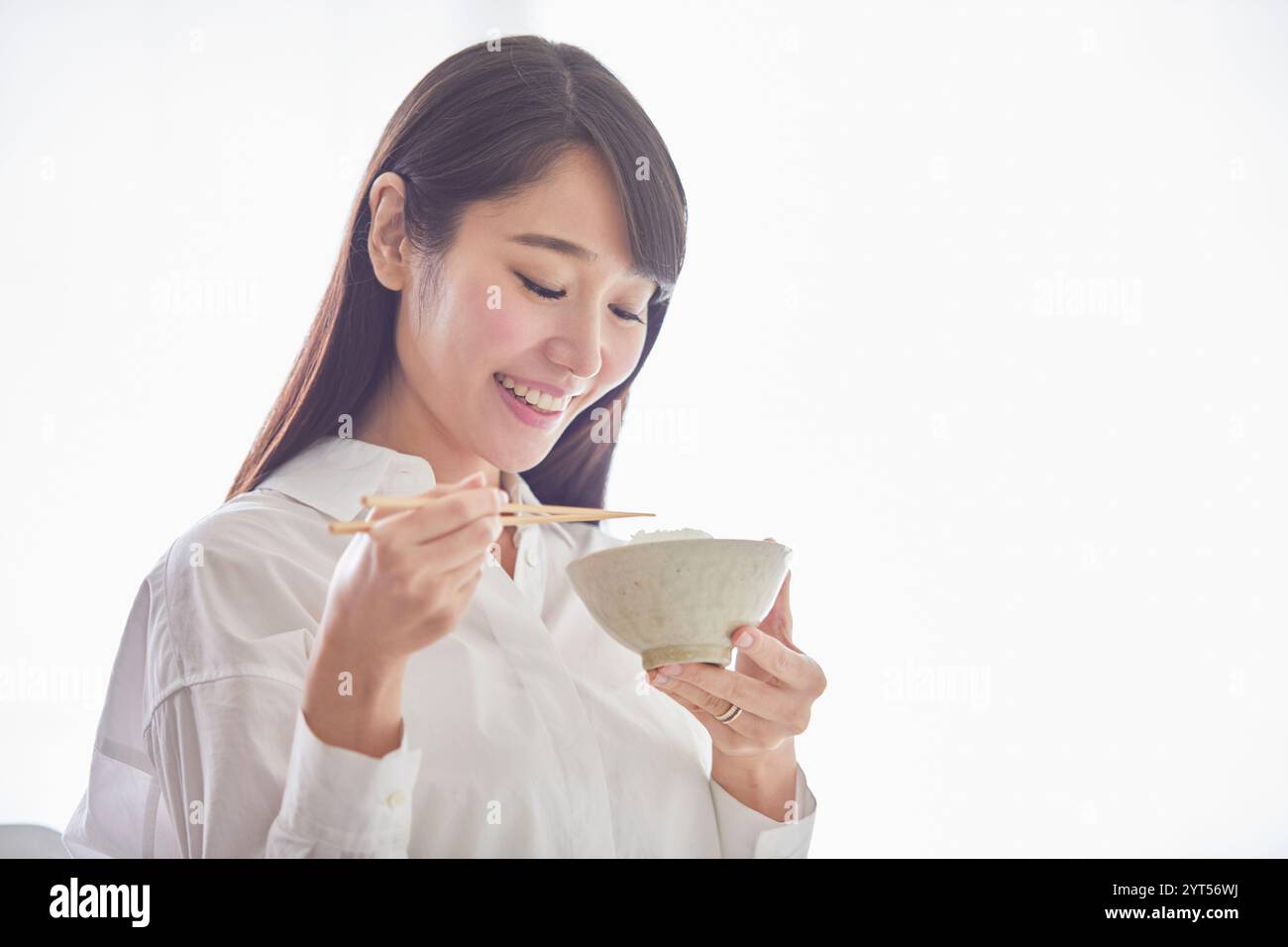 Woman eat rice in japanese hi-res stock photography and images - Alamy