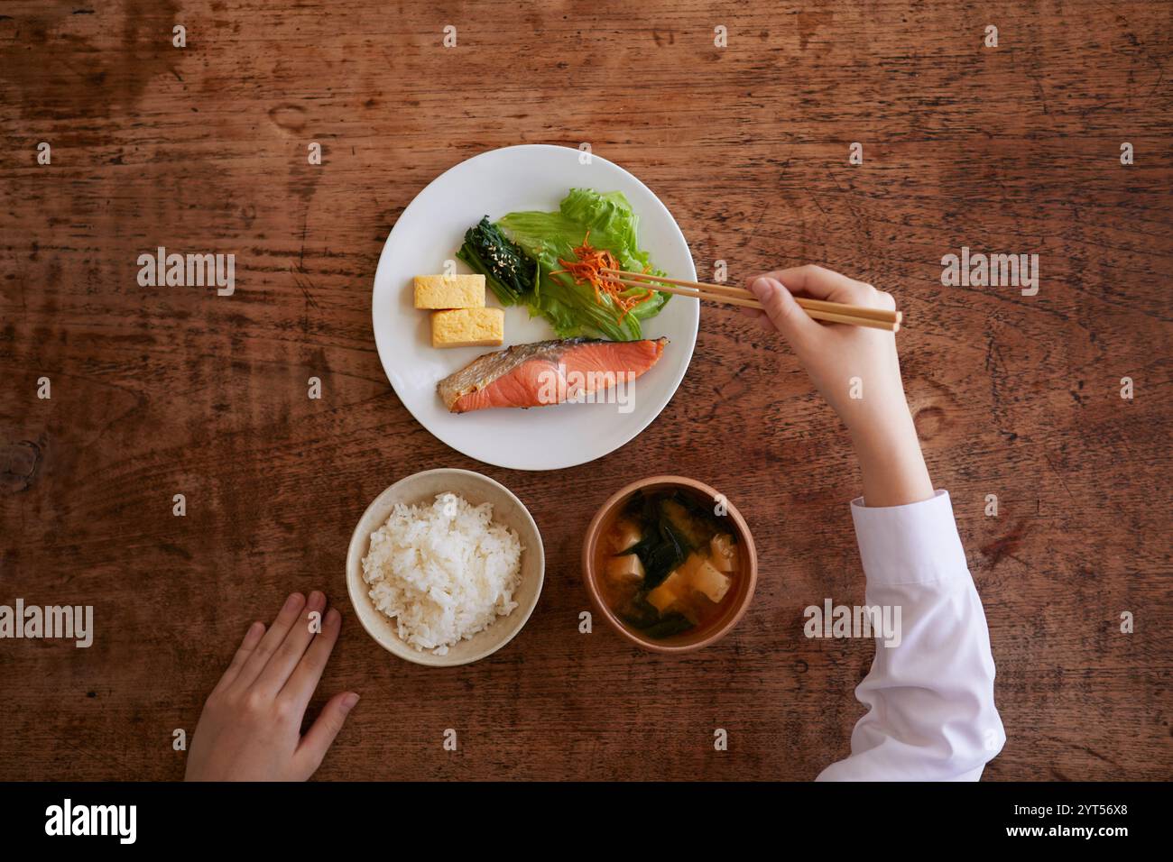 Student eating a meal Stock Photo - Alamy