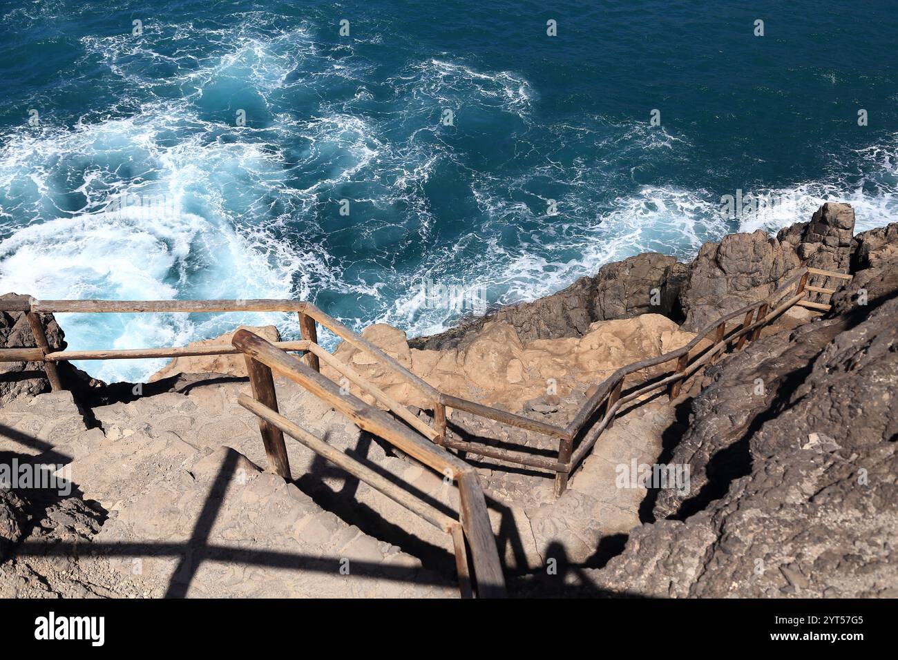 Wooden Stairs Leading to the Ocean on a Rocky Cliff on Fuerteventura ...